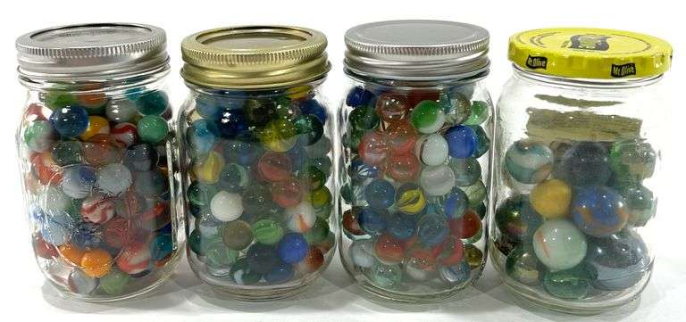 (4) Jars Full Of Marbles - Black And Gold Auctions