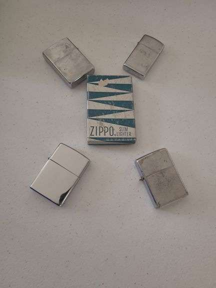 Zippo lighters (4) & 1 zippo box - Baker Auctions & Real Estate, LLC