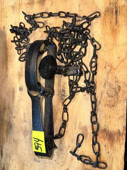 Small black animal trap - Baker Auctions & Real Estate, LLC