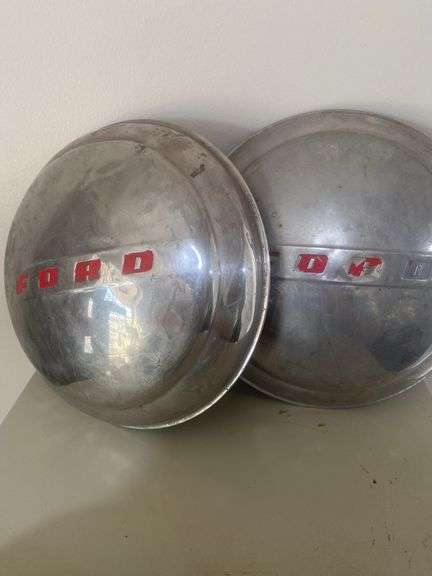 4 1930s ford hub caps - Baker Auctions & Real Estate, LLC