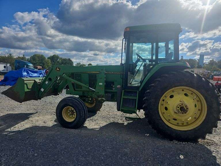 John Deere 7200 Cab Tractor with 720 Loader - Baker Auctions & Real ...
