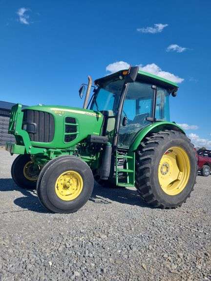 John Deere Model 6115 D - Baker Auctions & Real Estate, LLC