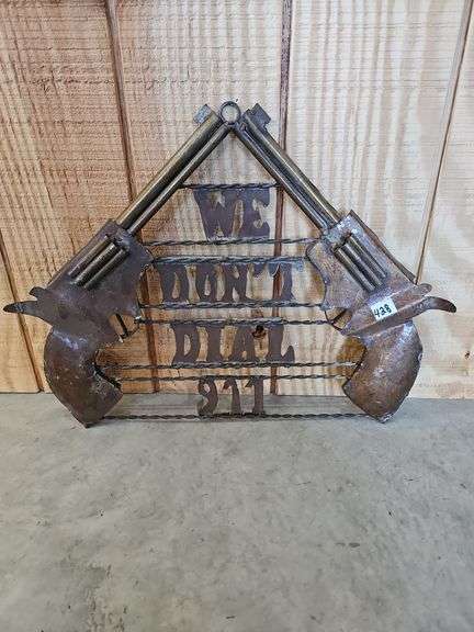 We Dont' Dial 911 metal sign - Baker Auctions & Real Estate, LLC