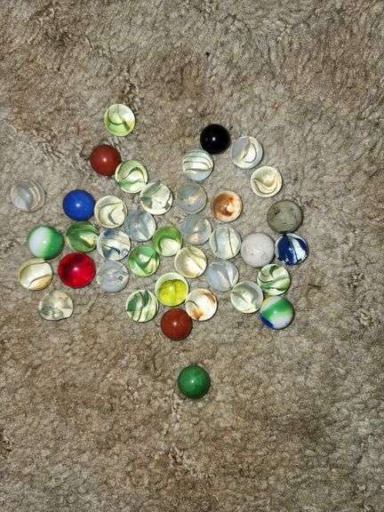Marbles - Baker Auctions & Real Estate, LLC