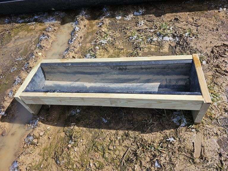 4ft Feed Trough w/ Wood Frame - Baker Auctions & Real Estate, LLC