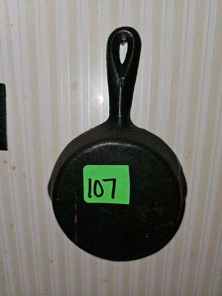 5pc cast iron decor - Baker Auctions & Real Estate, LLC