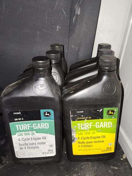 6 Bottles of Engine Oil & Funnels - Baker Auctions & Real Estate, LLC