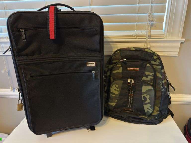 Camo Back Pack & Rome Rolling Luggage - Baker Auctions & Real Estate, LLC