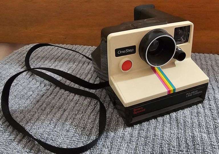 Vintage 1980s Polaroid Camera - Baker Auctions & Real Estate, LLC