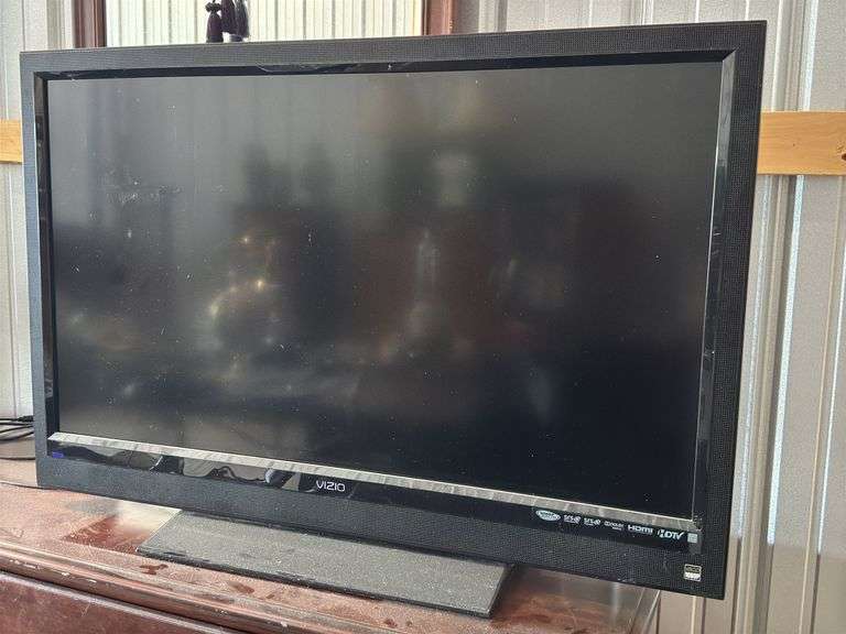 Vizio TV - Baker Auctions & Real Estate, LLC