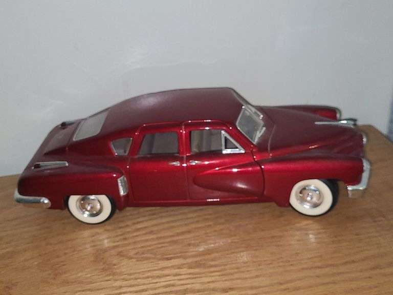 Metal cars - Baker Auctions & Real Estate, LLC