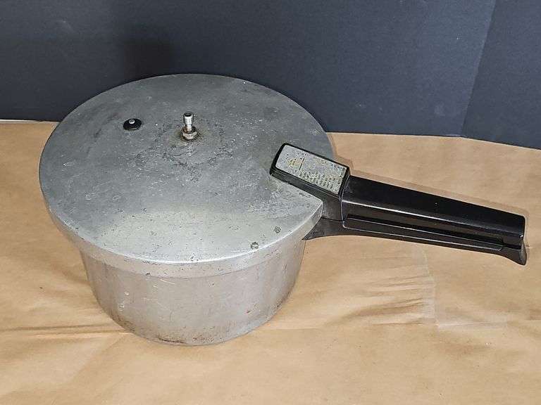 Pressure cooker - Baker Auctions & Real Estate, LLC