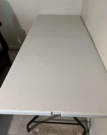 Folding table - Baker Auctions & Real Estate, LLC