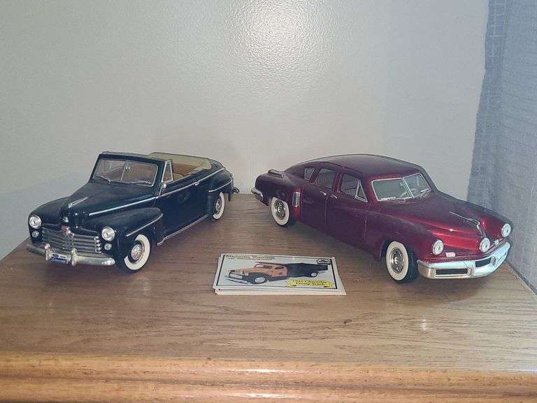 Metal cars - Baker Auctions & Real Estate, LLC