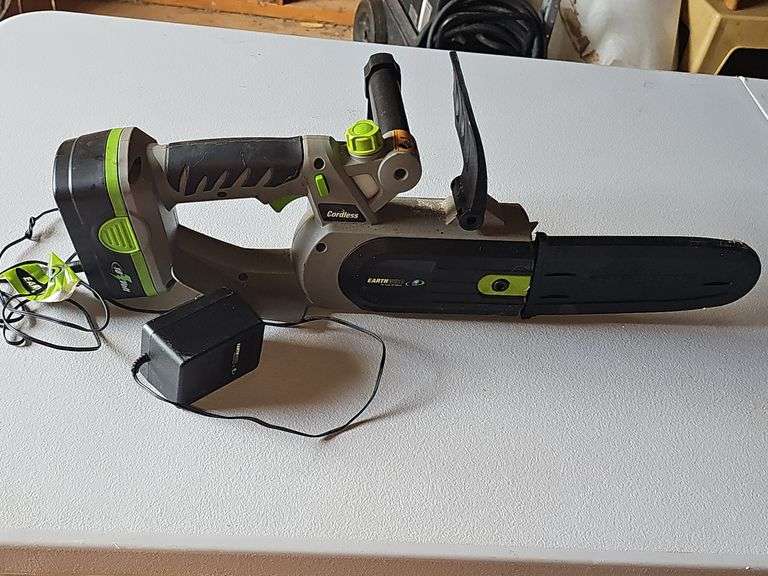 Earthwise battery powered chain saw - Baker Auctions & Real Estate, LLC