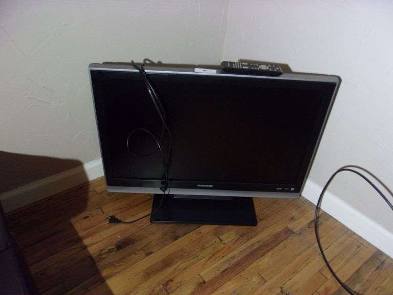 MAGNAVOX FLAT SCREEN TELEVISION W/ REMOTE - Bentley & Associates, LLC