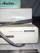 PANASONIC BH-780 ELECTRIC 3-HOLE PUNCH - Bentley & Associates, LLC