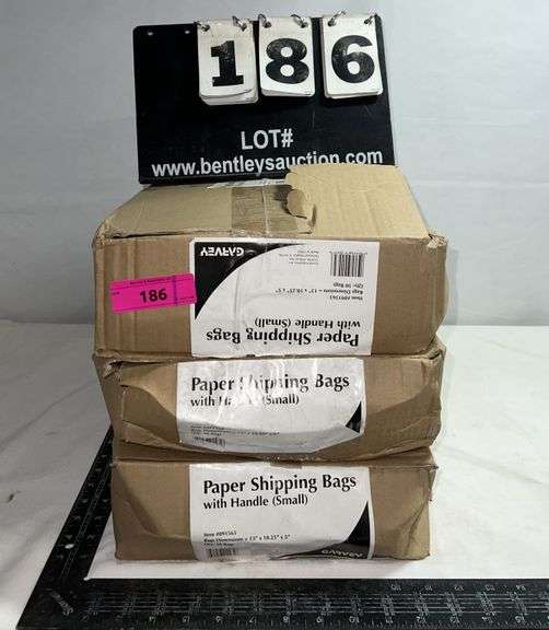 STACK: PAPER SHIPPING BAGS W/ HANDLE (3X MONEY) - Bentley & Associates, LLC