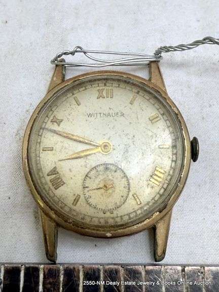 GOLD COLORED WATCH - MISSING HAND STRAP - Bentley & Associates, LLC