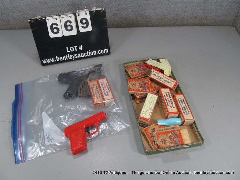 BOX: VINTAGE CAP GUN & OLD CAPS - Bentley & Associates, LLC