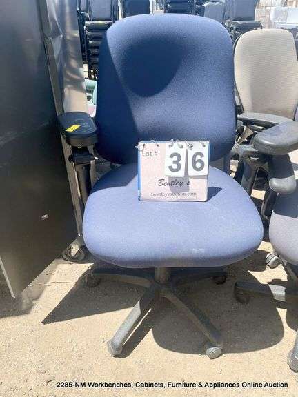 2-BLUE ROLLING OFFICE CHAIRS - Bentley & Associates, LLC