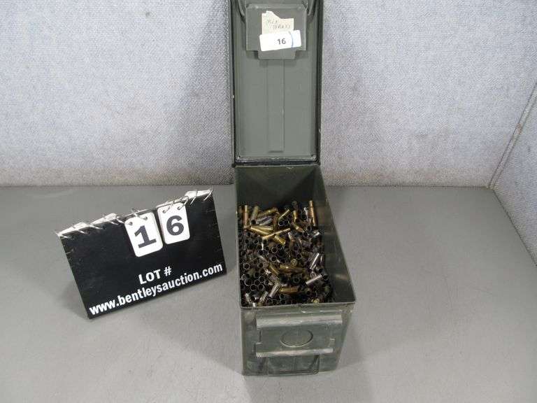 AMMO BOX W/ MIXED BRASS SHELLS - Bentley & Associates, LLC