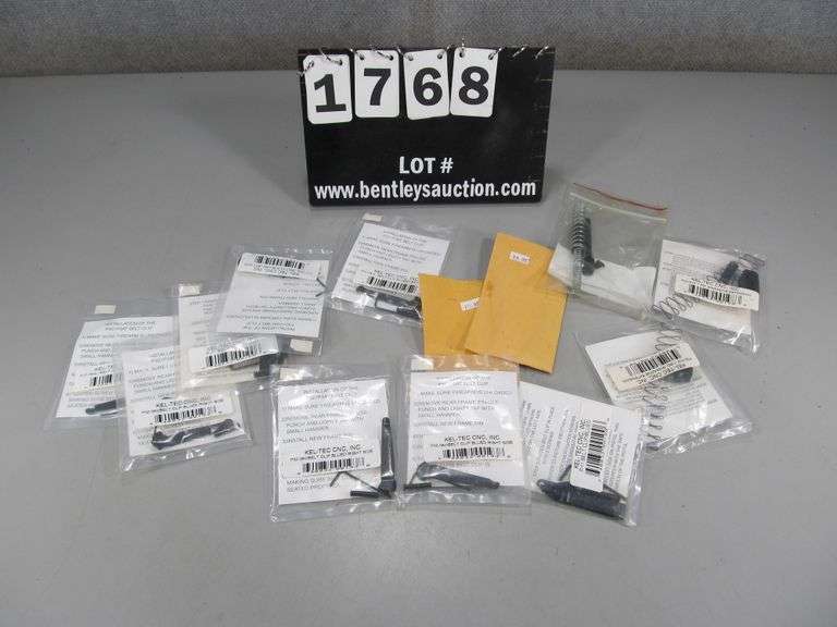 LOT: ASSORTED KEL TEC PISTOL CLIPS/BELT CLIPS, BERETTA RECOIL SPRING ...