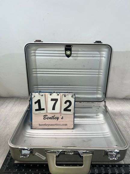 SILVER BRIEFCASE - EMPTY - Bentley & Associates, LLC