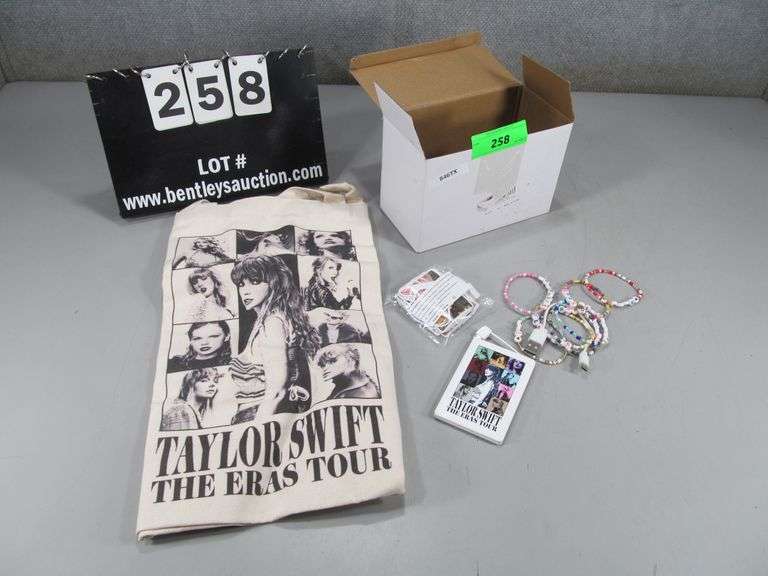 BOX: ASSORTED TAYLOR SWIFT MEMORBILIA - Bentley & Associates, LLC