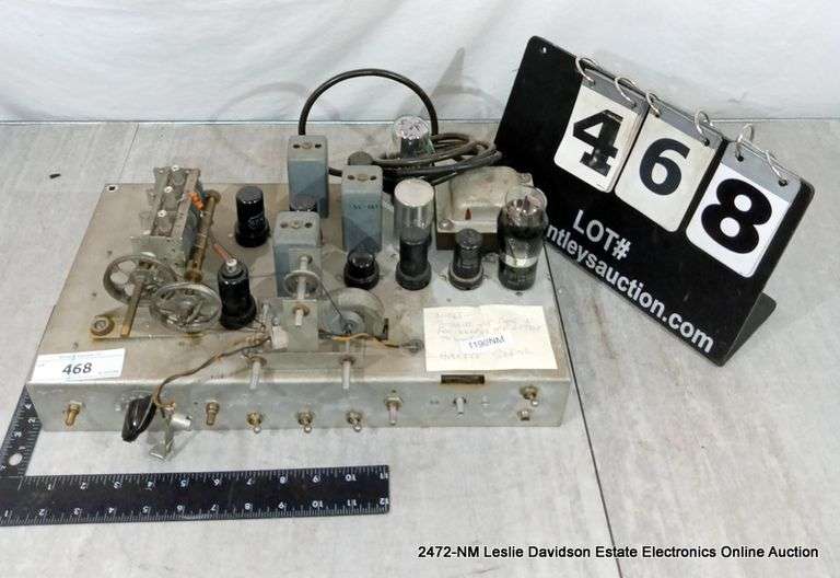 INSIDE OF VINTAGE RADIO/ RECEIVER - Bentley & Associates, LLC