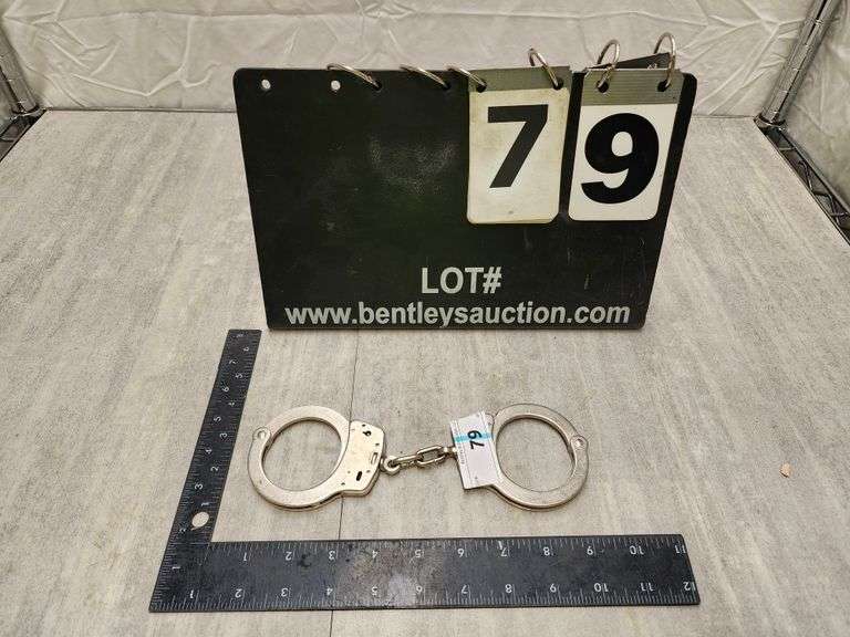 SMITH & WESSON HANDCUFFS - NO KEY - Bentley & Associates, LLC