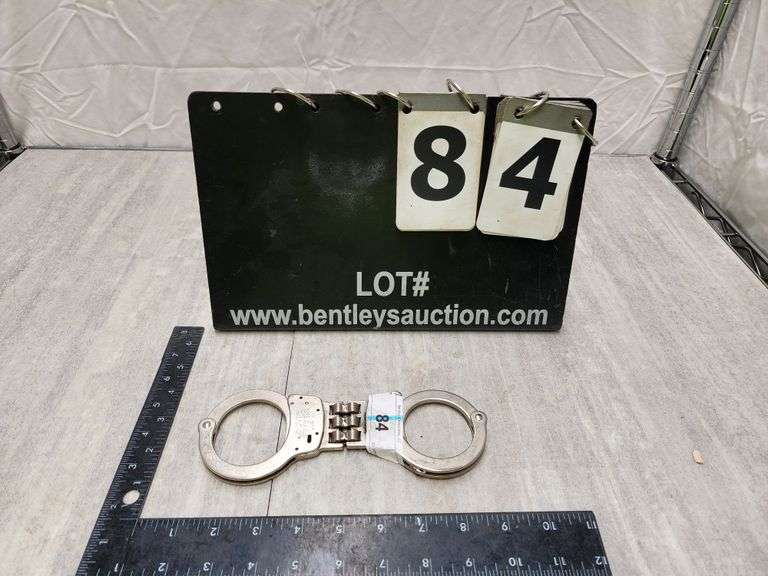 SMITH & WESSON HANDCUFFS - NO KEY - Bentley & Associates, LLC