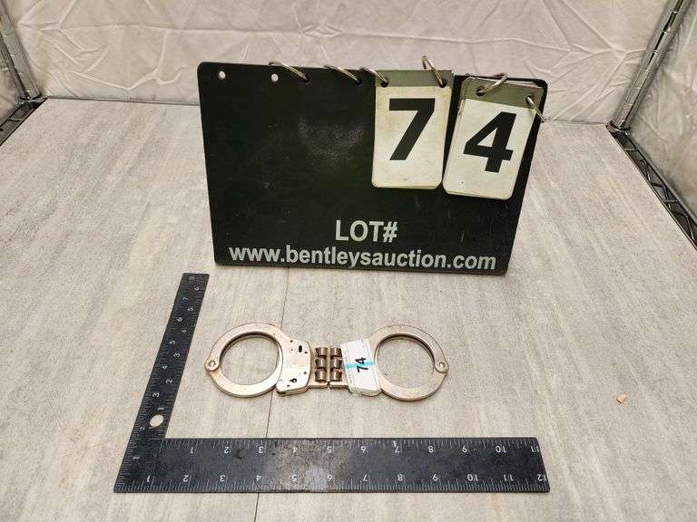 SMITH & WESSON HANDCUFFS - NO KEY - Bentley & Associates, LLC