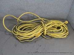 BLACK & YELLOW EXTENSION CORD - Bentley & Associates, LLC
