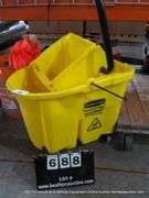 RUBBERMAID WAVE BREAK MOP BUCKET & WRINGER - Bentley & Associates, LLC