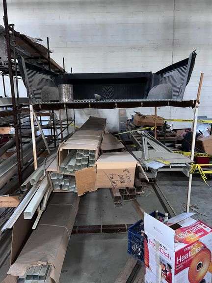 RACK W/ MISC ALUMINUM & PLASTIC TRUNK LINER - Bentley & Associates, LLC