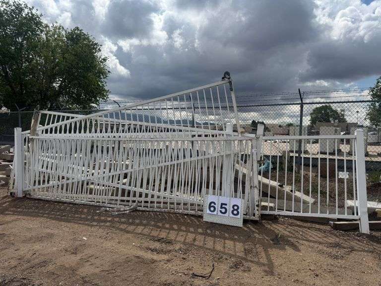 WHITE METAL GATES - DAMAGED - Bentley & Associates, LLC