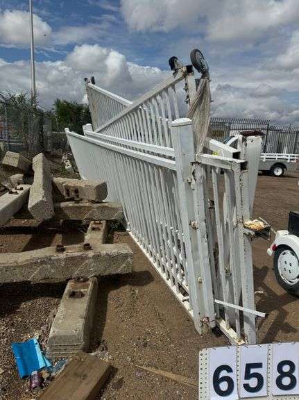 WHITE METAL GATES - DAMAGED - Bentley & Associates, LLC