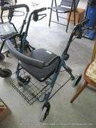 GUARDIAN LIGHT BLUE FOLDING CASTERED WALKER - Bentley & Associates, LLC