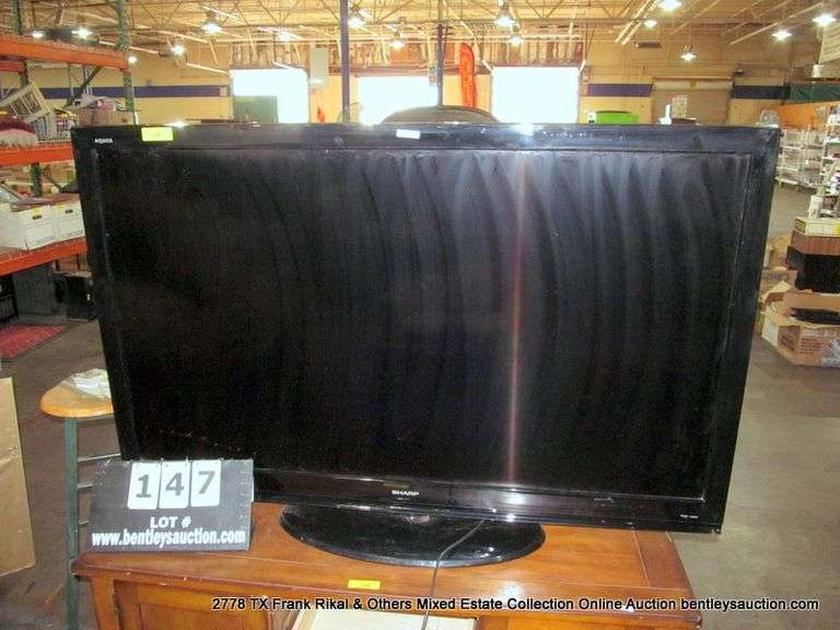 SHARP 60" TELEVISION W/ STAND, MODEL#LC-60E69U - Bentley & Associates, LLC
