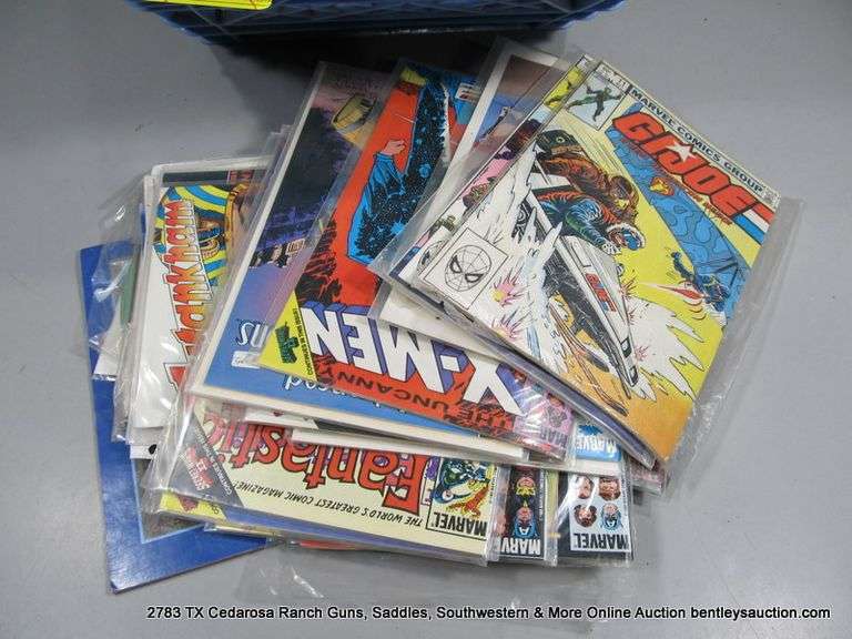 BLUE MILK CRATE W/ ASSORTED COMIC BOOKS - Bentley & Associates, LLC