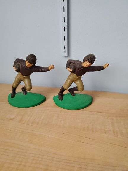 Pair cast iron football player bookends, 5.5" H - Bid-Assets Online ...