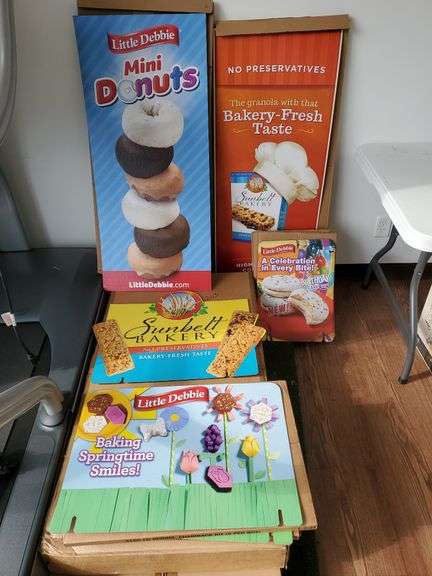 Store displays including (4) Little Debbie mini donut signs measuring ...