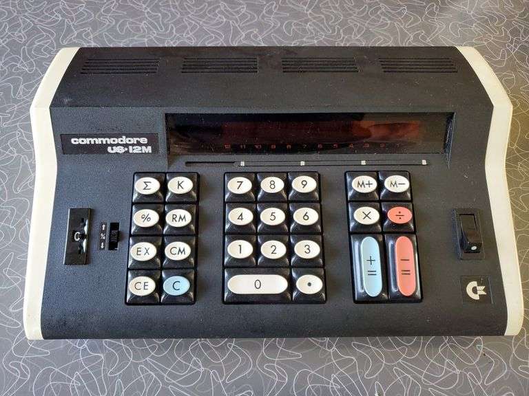 Collectible Commodore US 12m calculator. Missing cord but has original ...