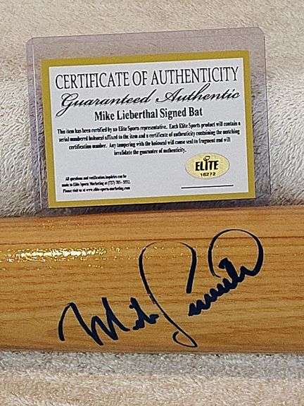 Mike Lieberthal autographed baseball bat. Blue Sharpie on the barrel ...
