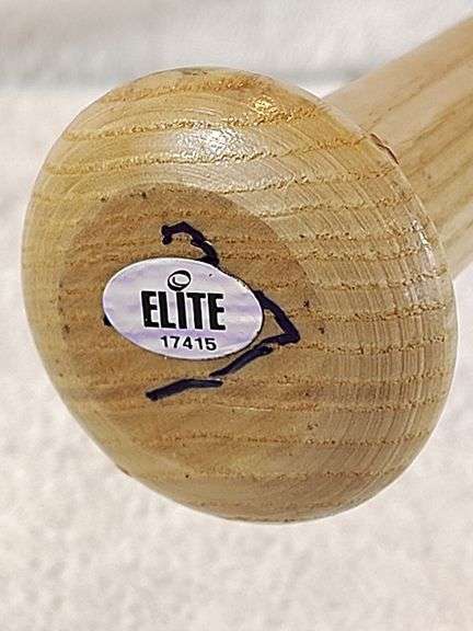 Tony Batista autographed baseball bat. Blue Sharpie on the barrel and ...