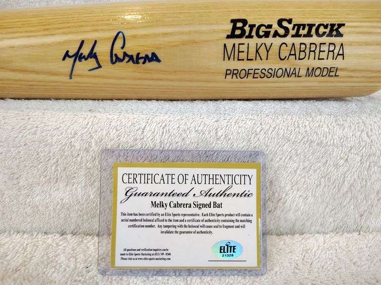 Melky Cabrera autographed baseball bat. Blue Sharpie on the barrel ...