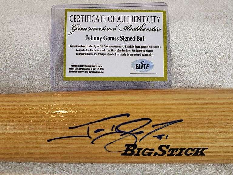 Johnny Gomes autographed Baseball bat. Blue Sharpie on the barrel ...