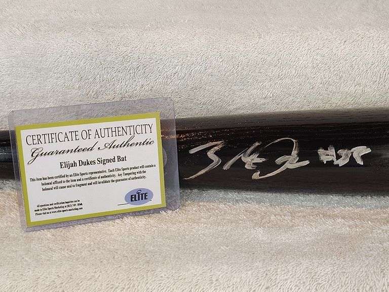 Elijah Dukes autographed baseball bat. Silver sharpie on the barrel ...