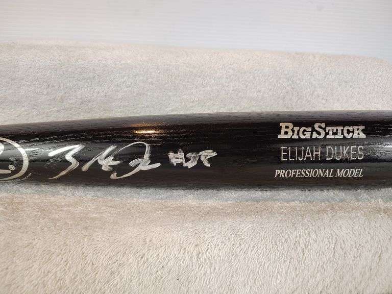 Elijah Dukes autographed baseball bat. Silver sharpie on the barrel ...
